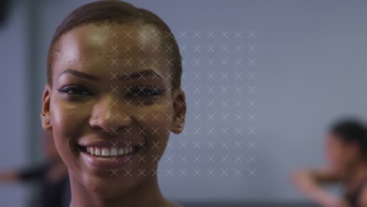 Portrait Of A Mixed Race Modern Female Dancer Looking At The Camera